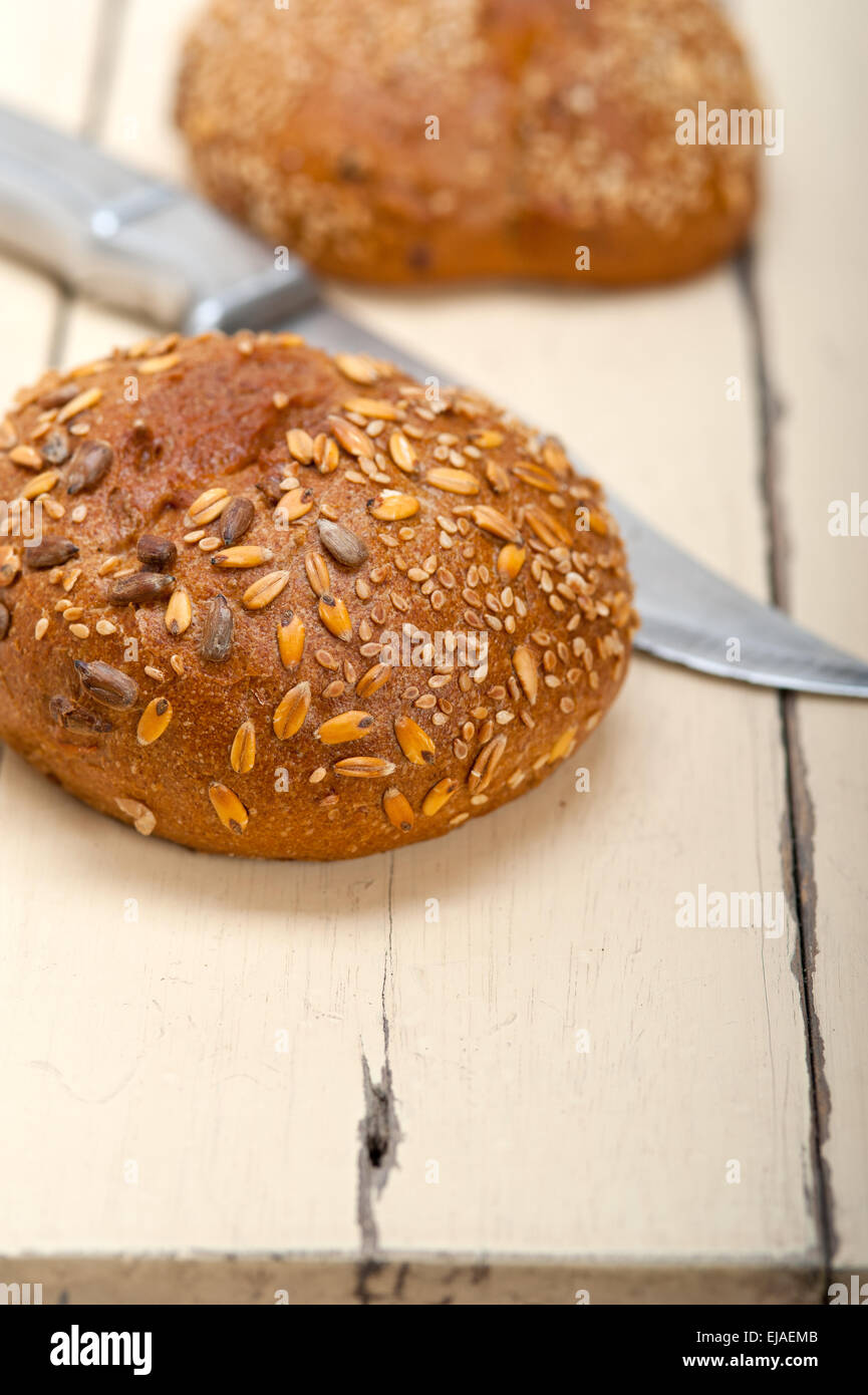 organic bread over rustic table Stock Photo - Alamy