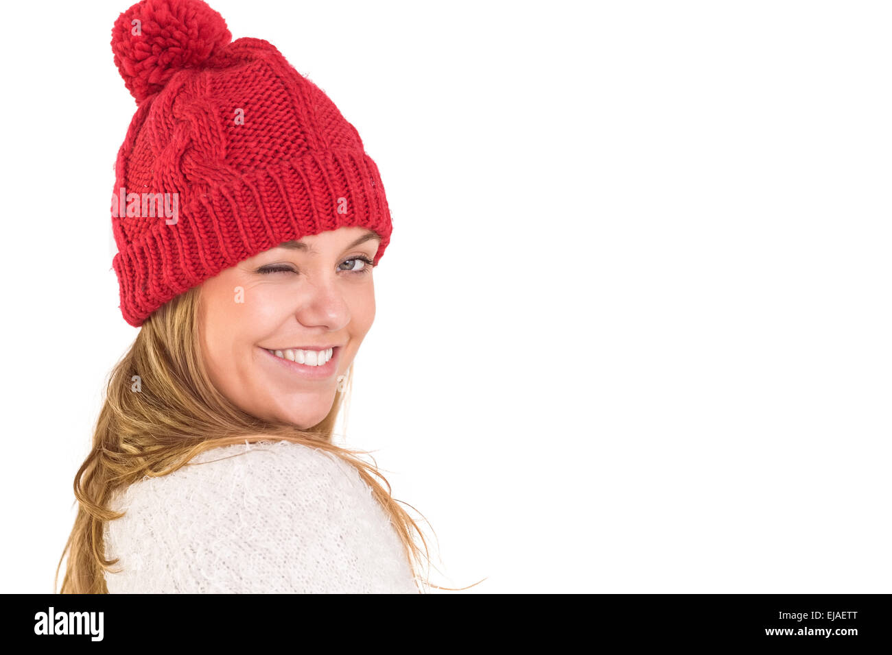 Smiling young blonde woman winking hi-res stock photography and images ...