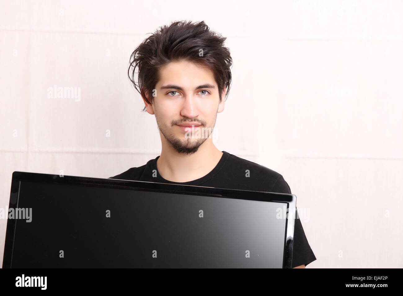 Man with a TV Stock Photo - Alamy