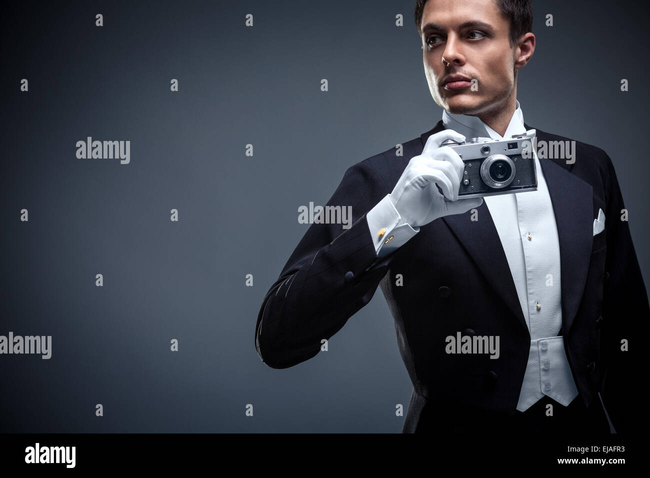 Man with camera Stock Photo - Alamy