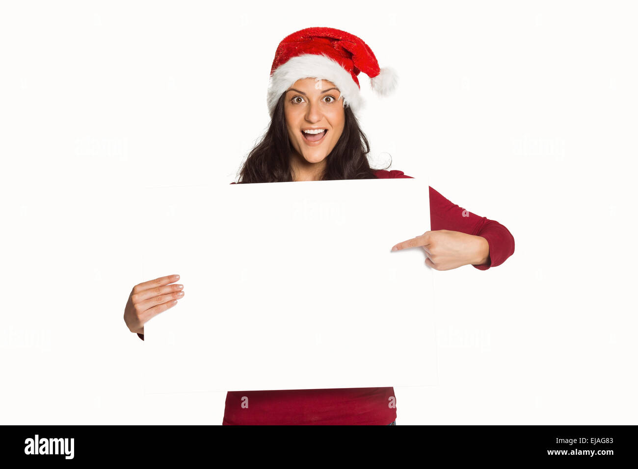 Woman pointing at white sign Stock Photo - Alamy