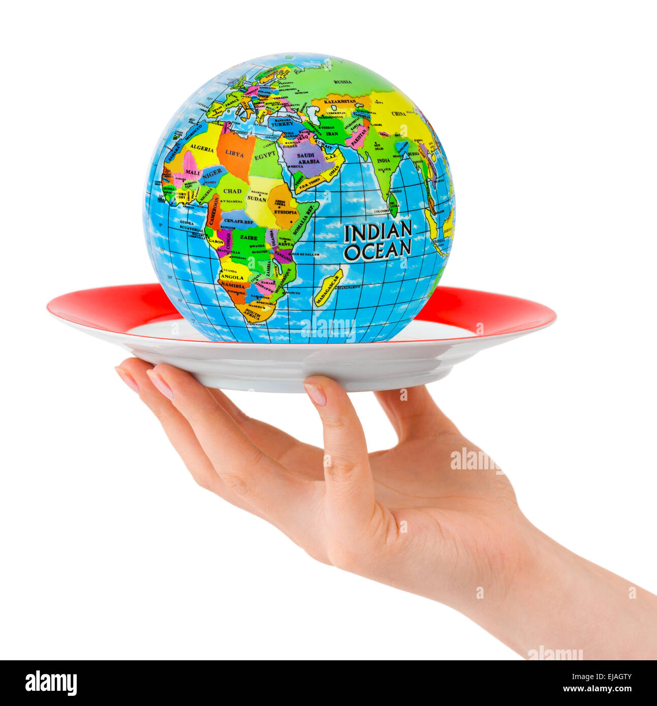 Hand with plate and globe Stock Photo - Alamy