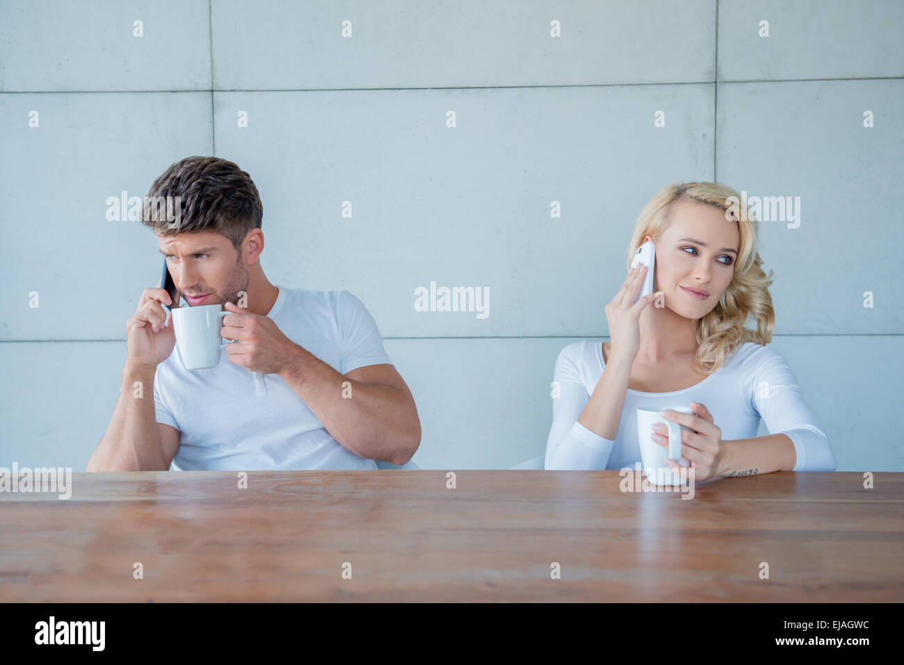 Using two phones hi-res stock photography and images - Alamy