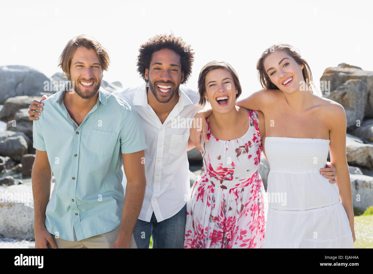 Gorgeous friends smiling at camera Stock Photo - Alamy