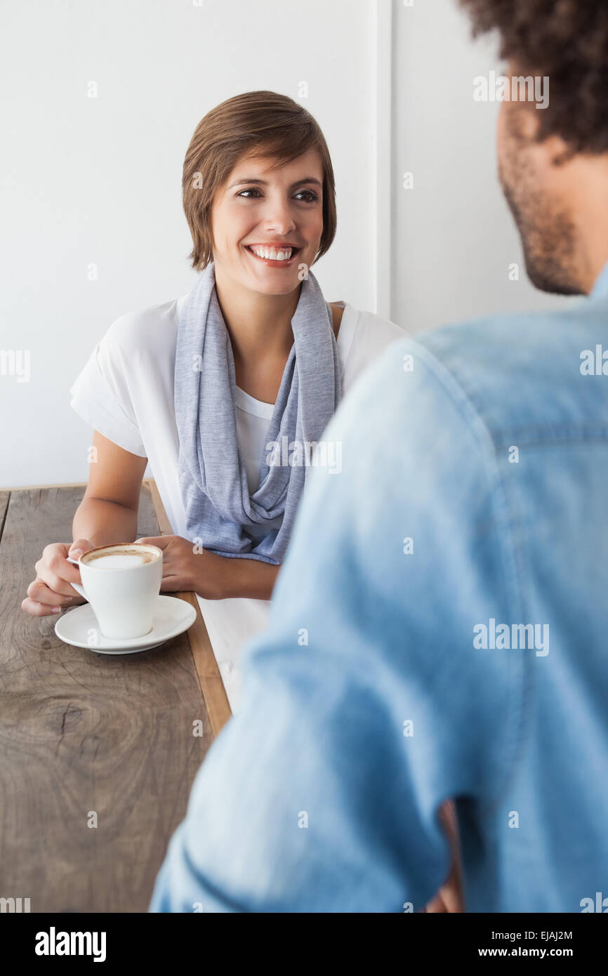 Young woman having coffee friend hi-res stock photography and images ...