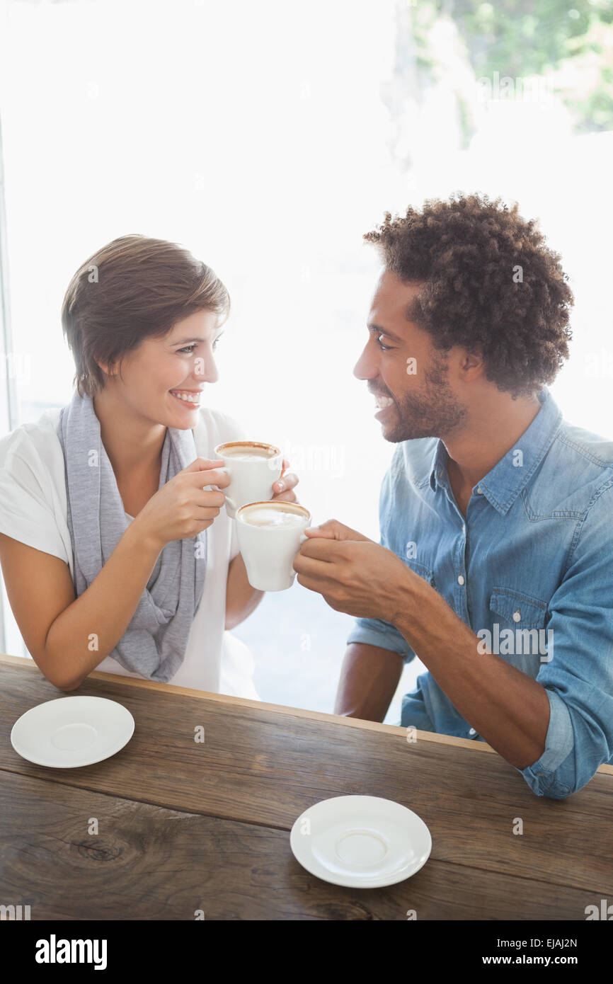 Casual couple having coffee together Stock Photo - Alamy