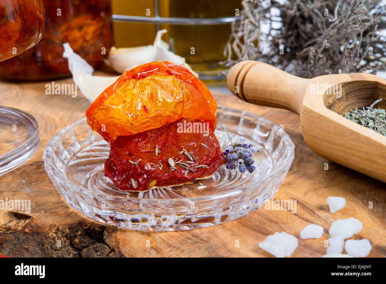 Dried tomatoes in olive oil Stock Photo - Alamy