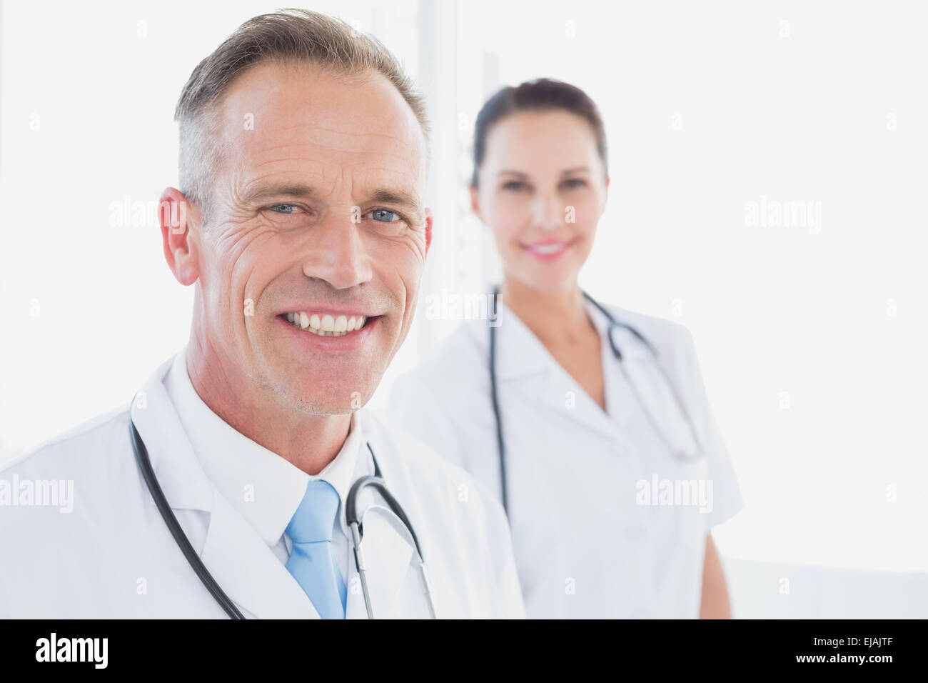 Doctor looking at the camera Stock Photo - Alamy