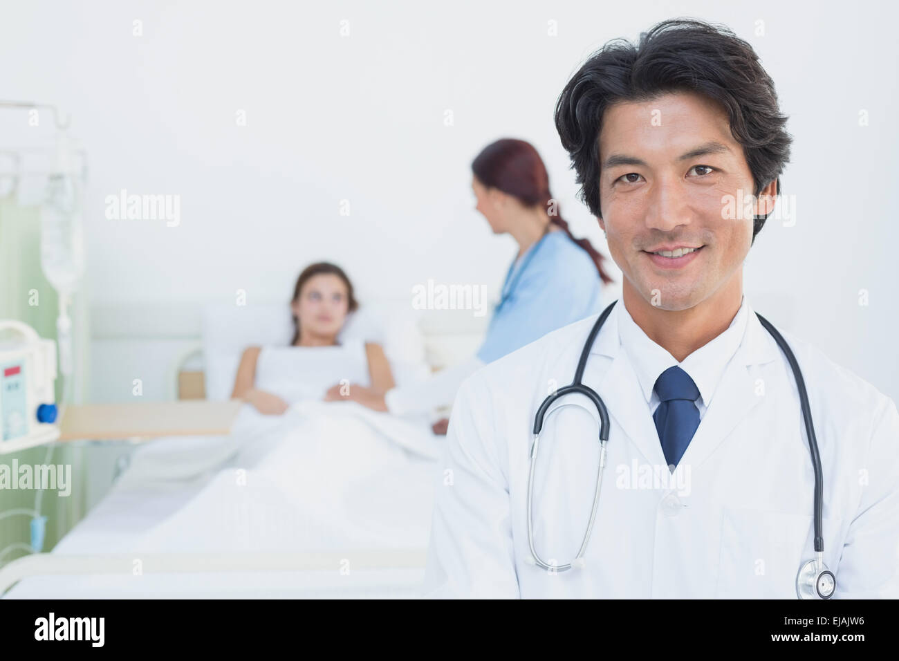 Doctor looking at the camera Stock Photo - Alamy