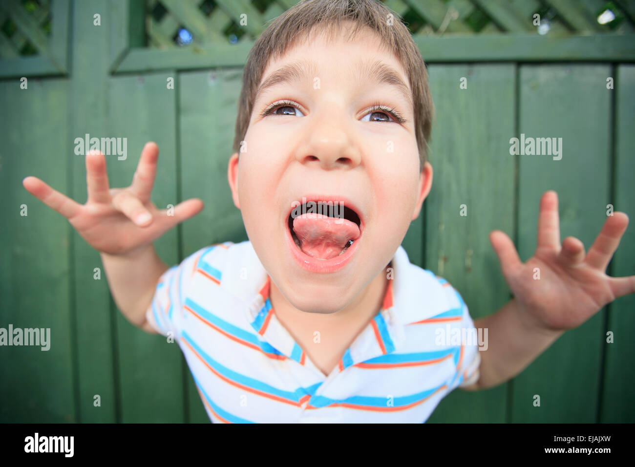 Funny face of a little boy hi-res stock photography and images - Alamy