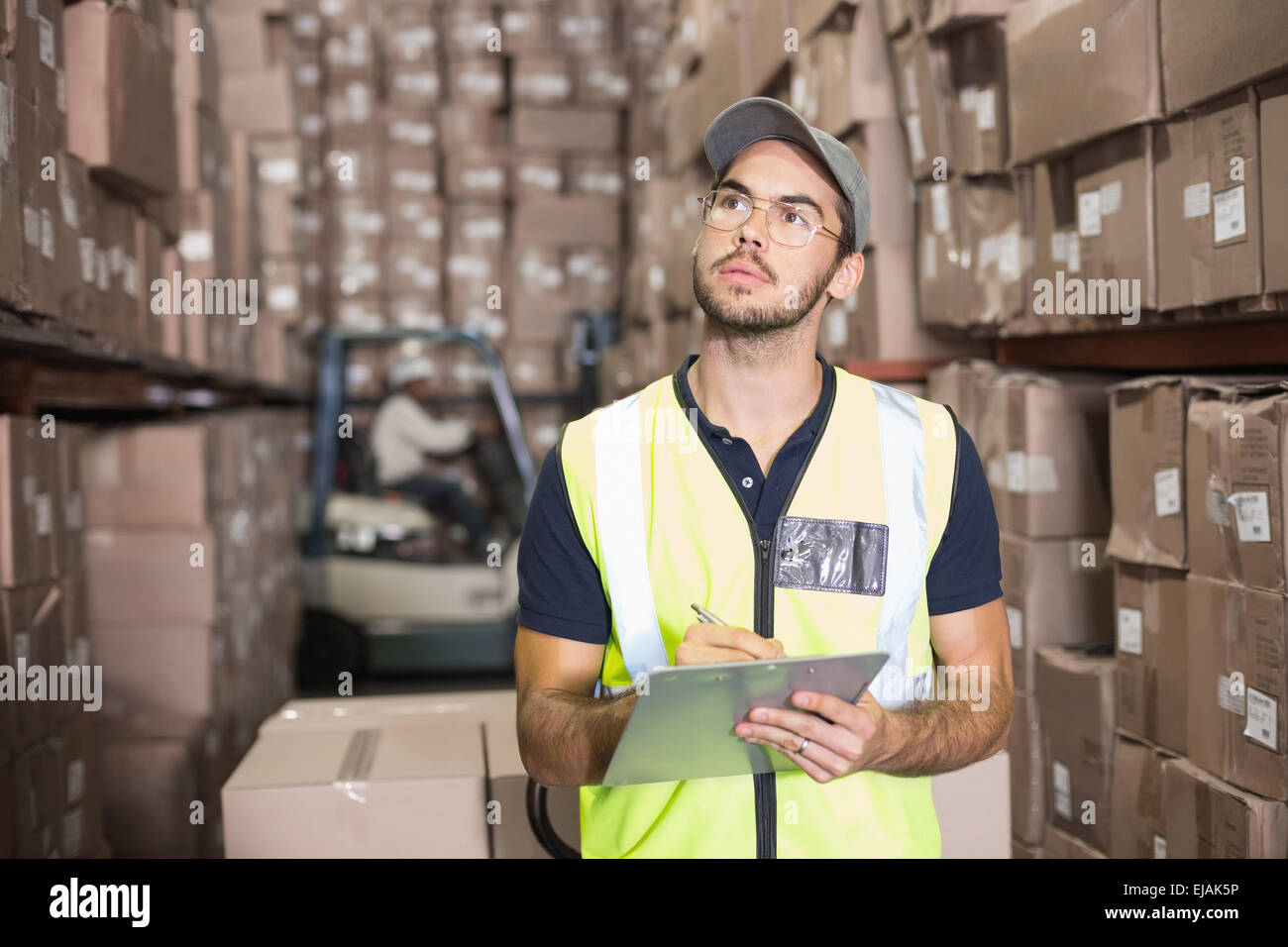 Checking the list hi-res stock photography and images - Alamy