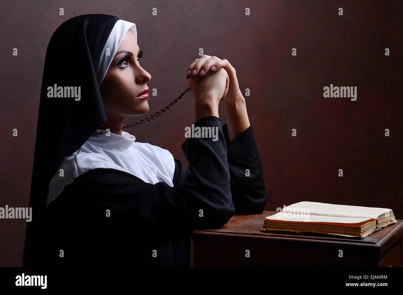 Praying nun caucasian hi-res stock photography and images - Alamy