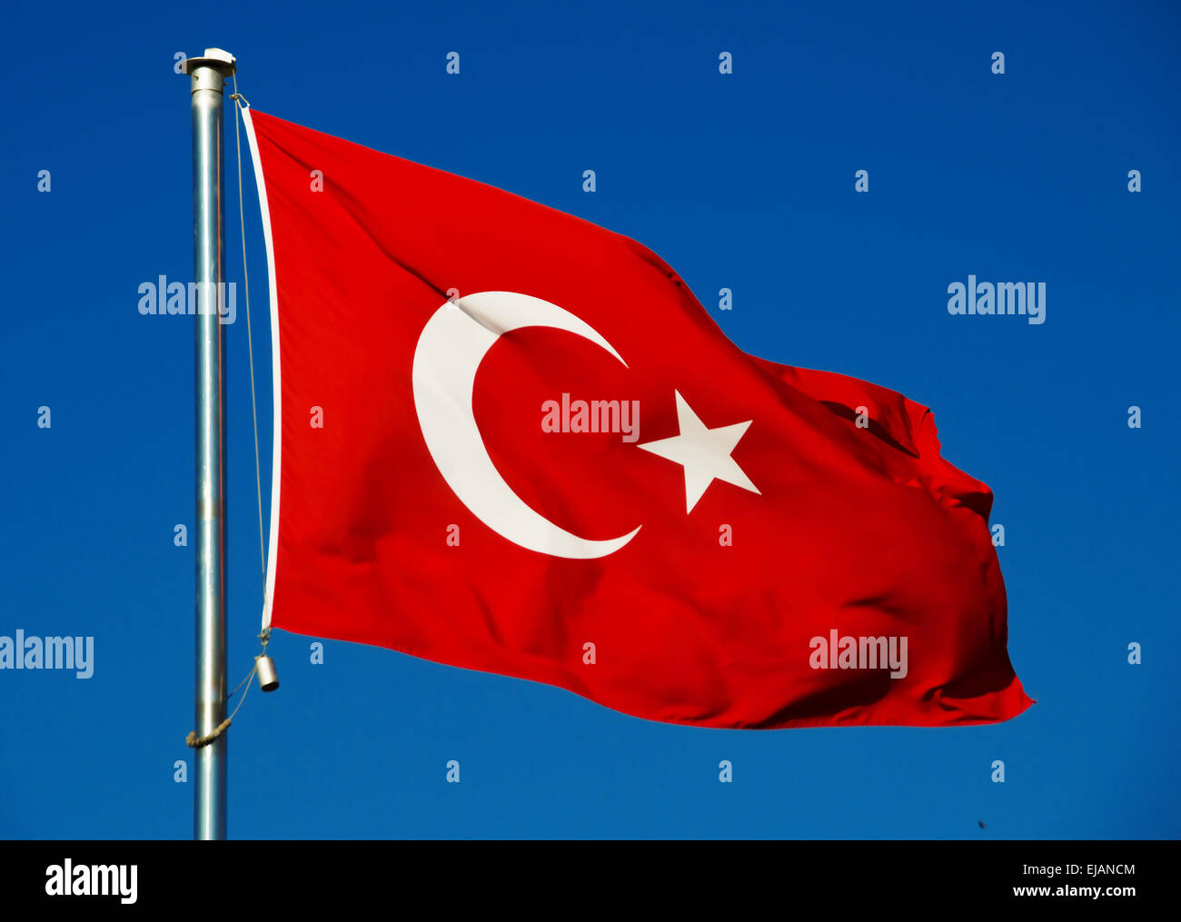 Turkish national flag over blue sky Stock Photo - Alamy