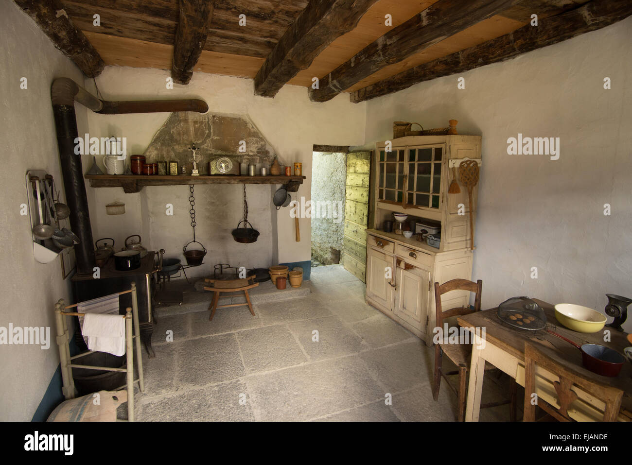 A kitchen of a historic home brought to the open-air museum at ...