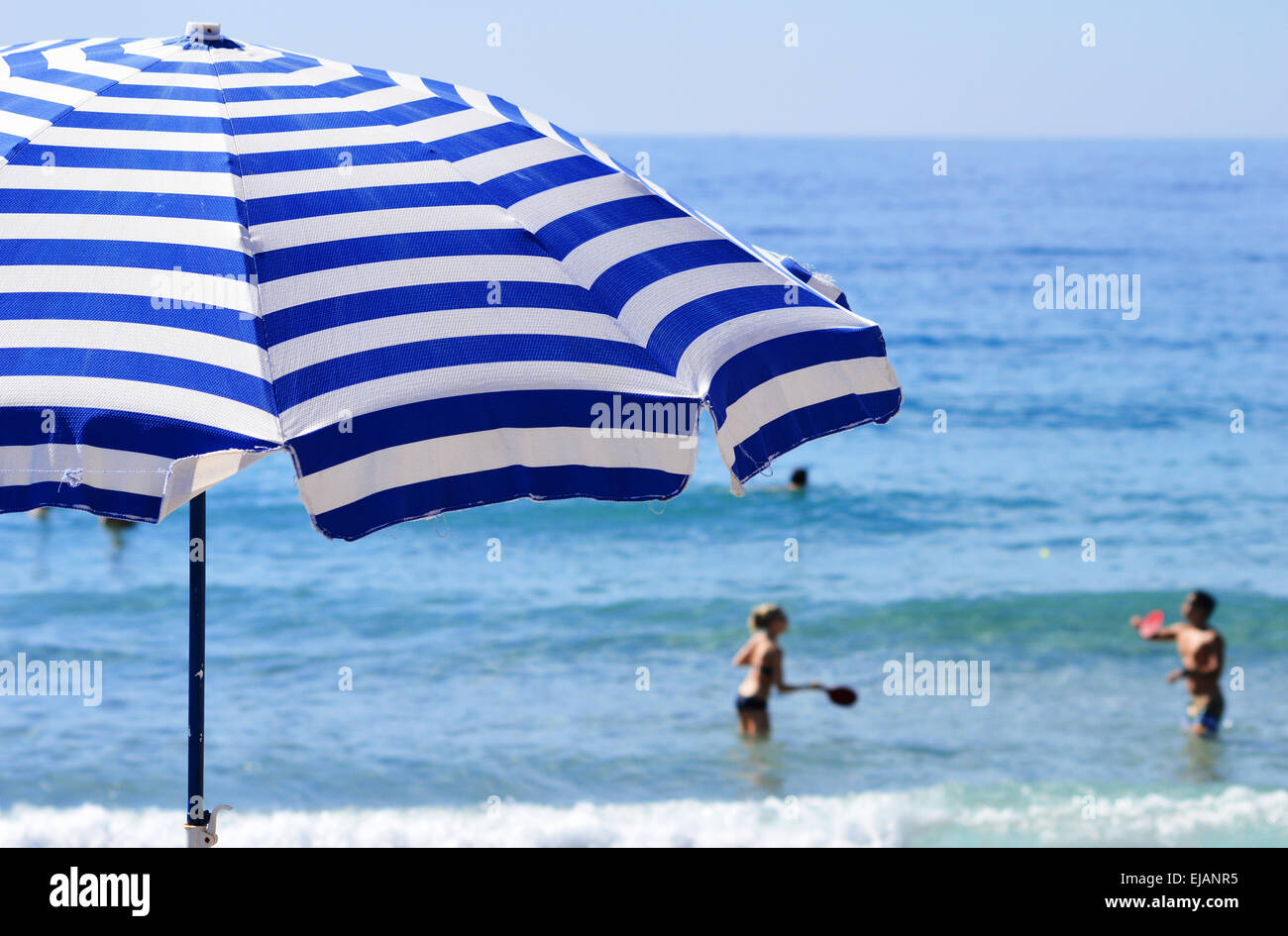 Mediterranean beach during hot summer day Stock Photo - Alamy