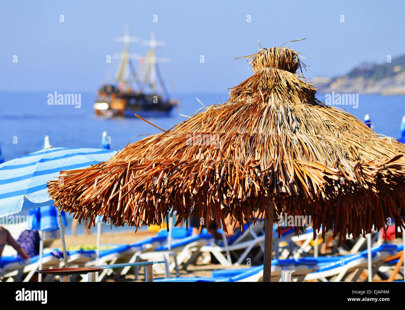 Mediterranean beach during hot summer day Stock Photo - Alamy