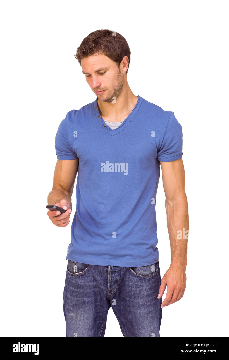 Man standing using phone Cut Out Stock Images & Pictures - Alamy