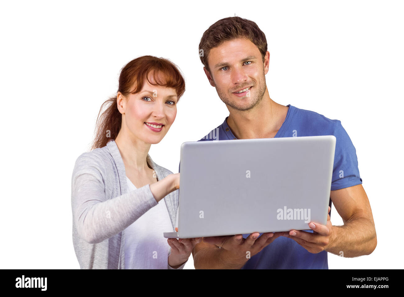 Cute happy couple looking laptop hi-res stock photography and images ...
