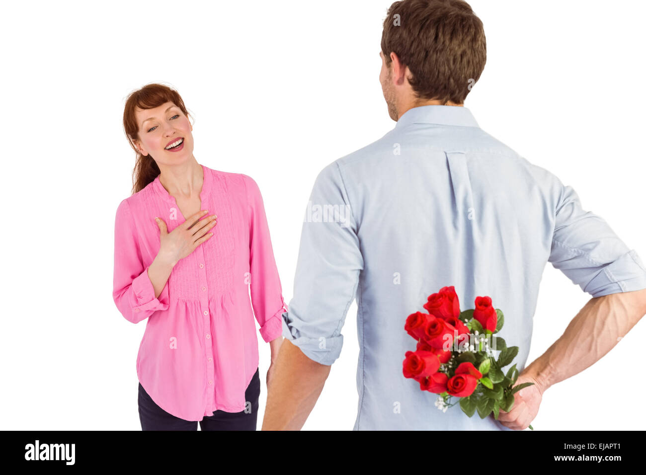 Man holding roses behind him Stock Photo - Alamy