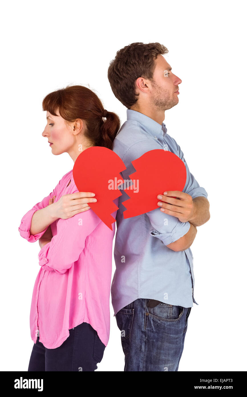 Couple holding a broken heart Stock Photo - Alamy