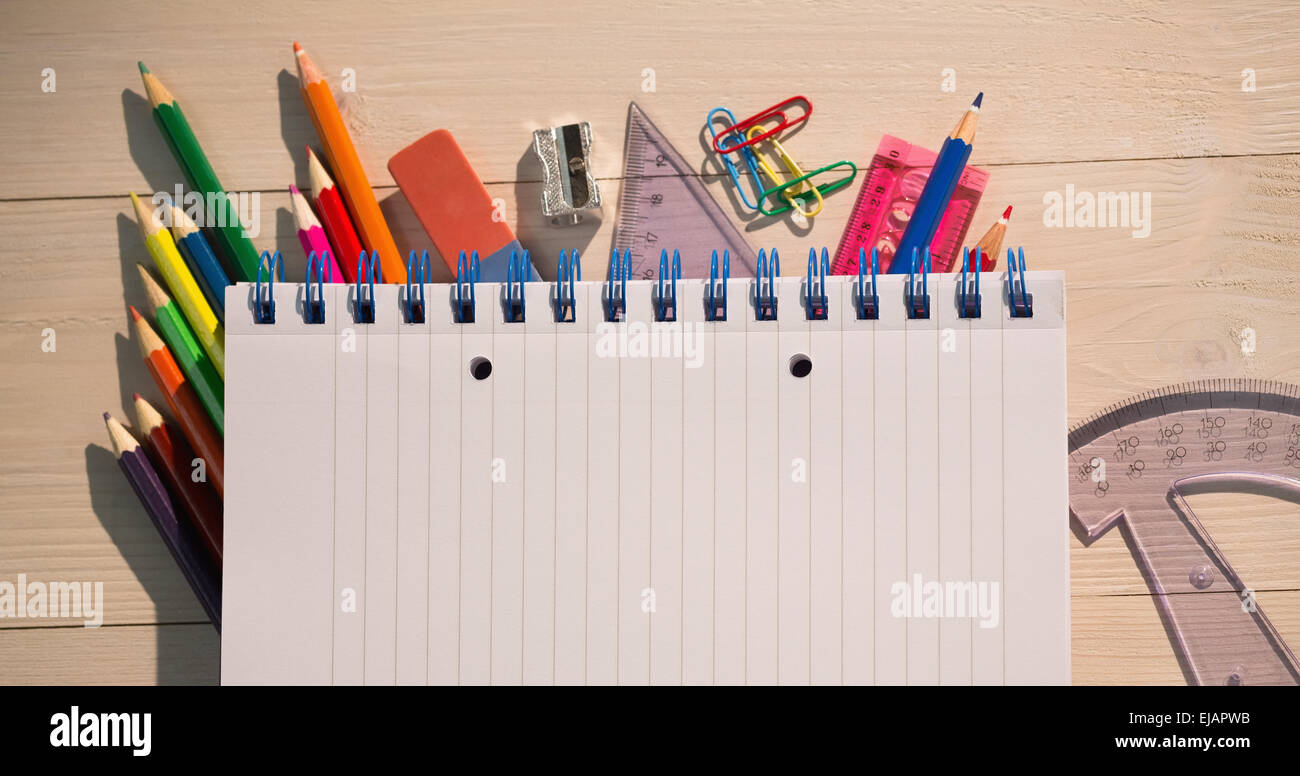 Students table with school supplies Stock Photo - Alamy