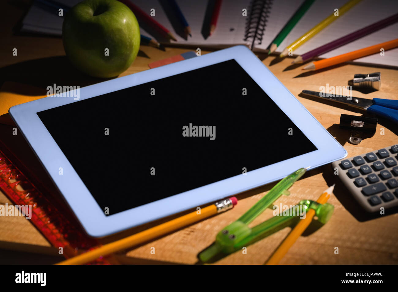 Students table with school supplies Stock Photo - Alamy