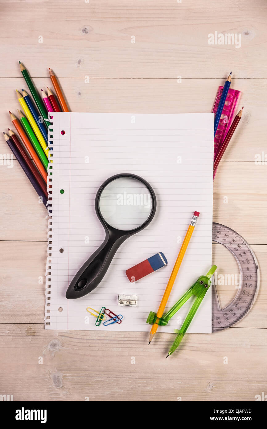 Students table with school supplies Stock Photo - Alamy