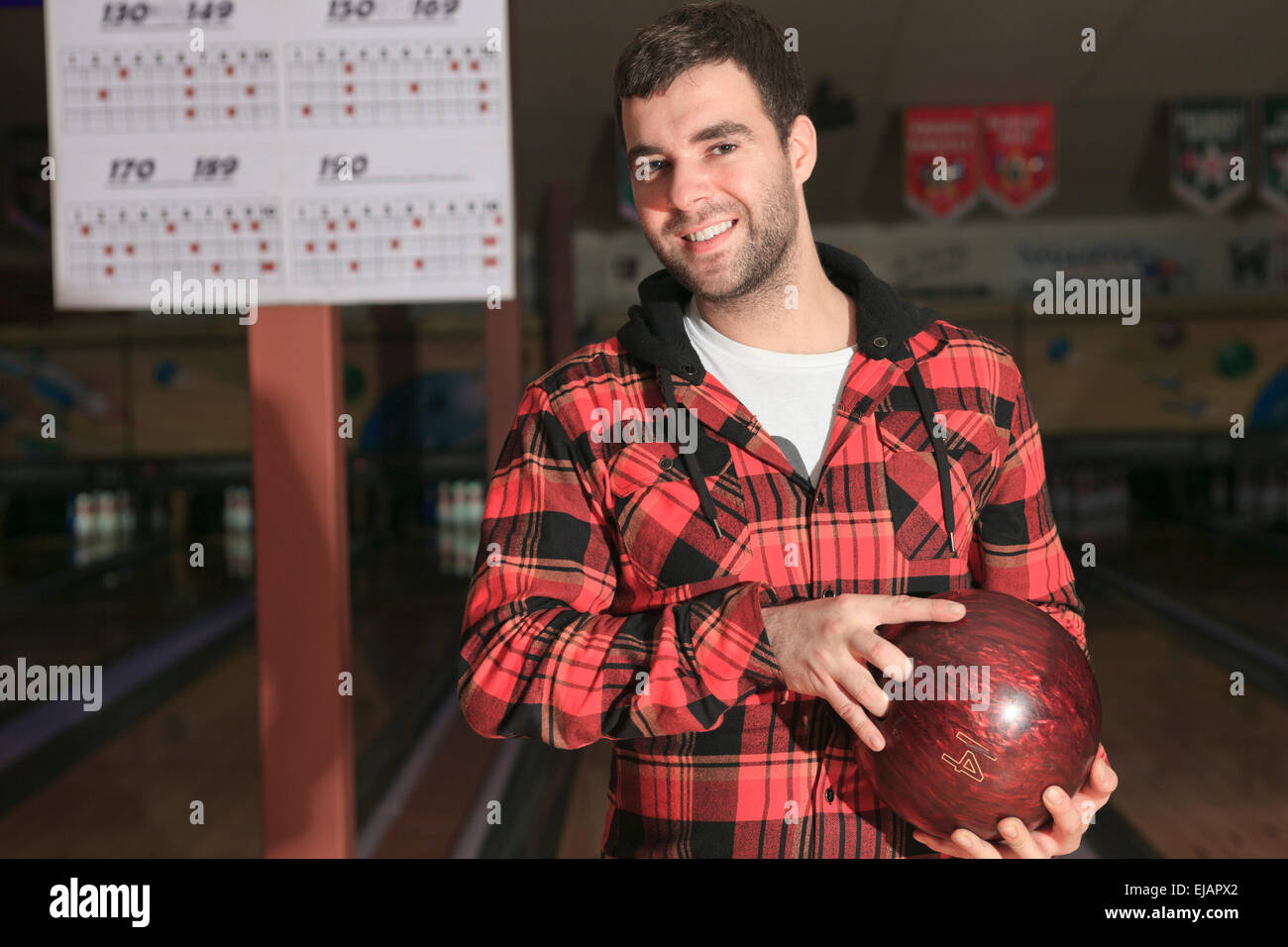 A bowling player in the alley Stock Photo - Alamy