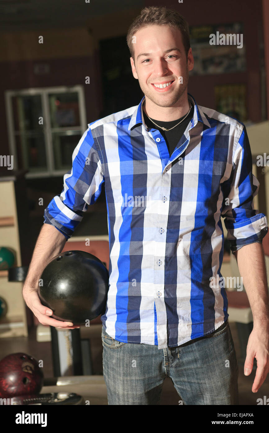 A bowling player in the alley Stock Photo - Alamy