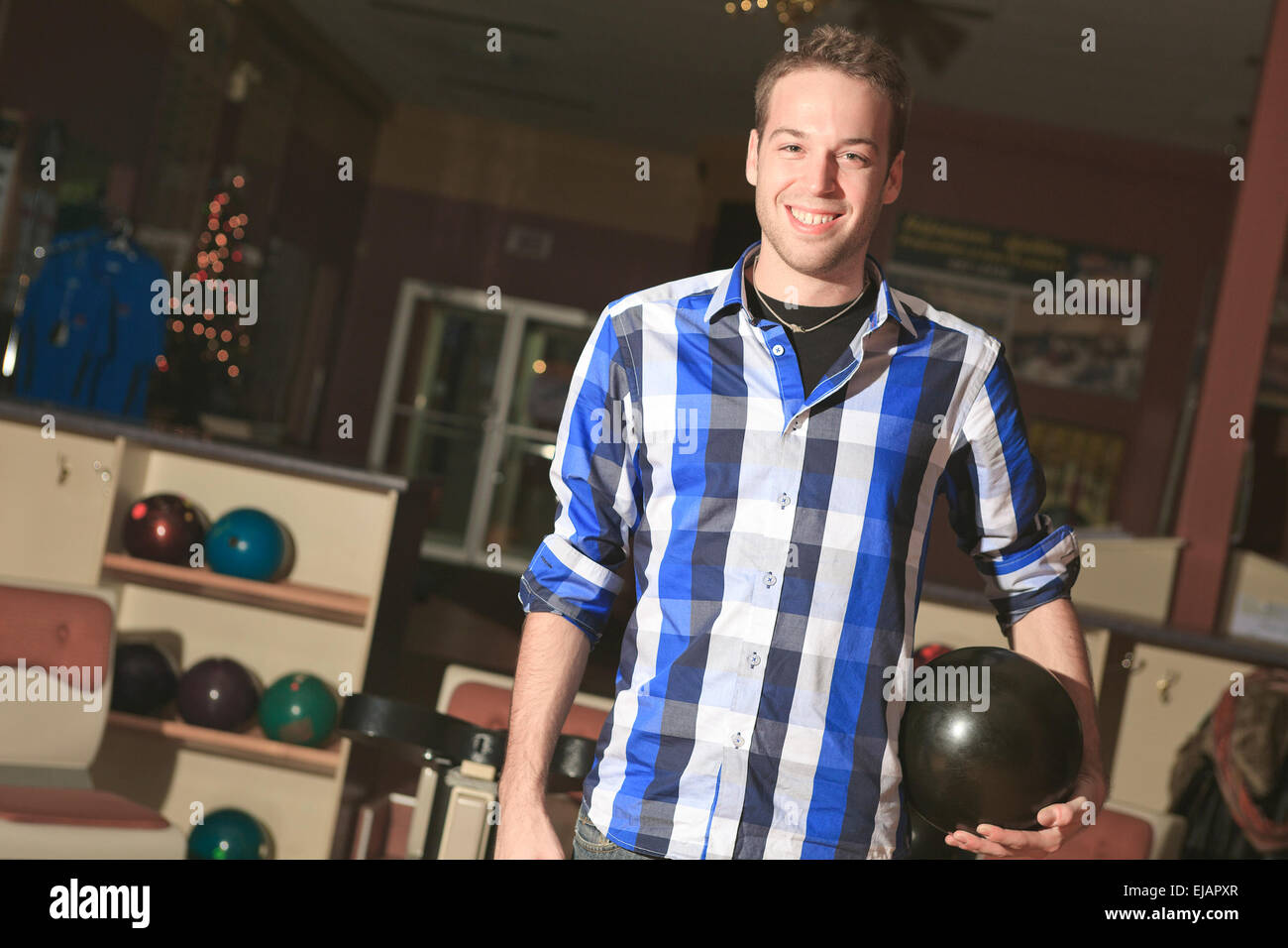 A bowling player in the alley Stock Photo - Alamy
