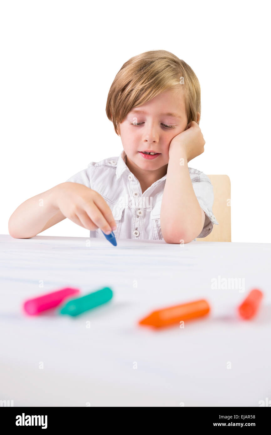 Student using crayons to draw Stock Photo - Alamy