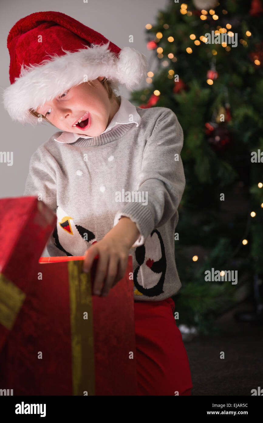 Child opening his christmas present Stock Photo - Alamy