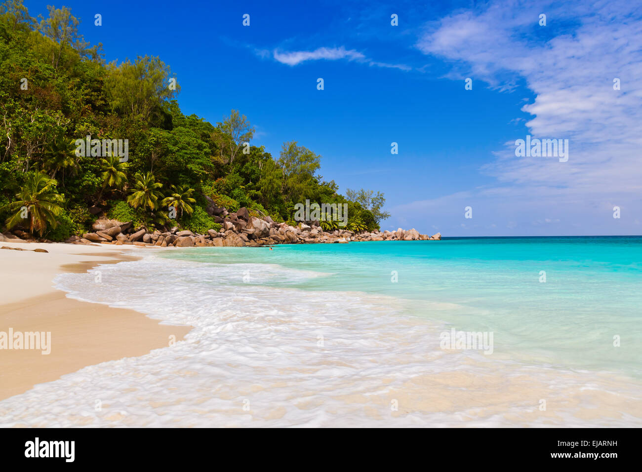 Tropical beach at island Praslin Seychelles Stock Photo - Alamy