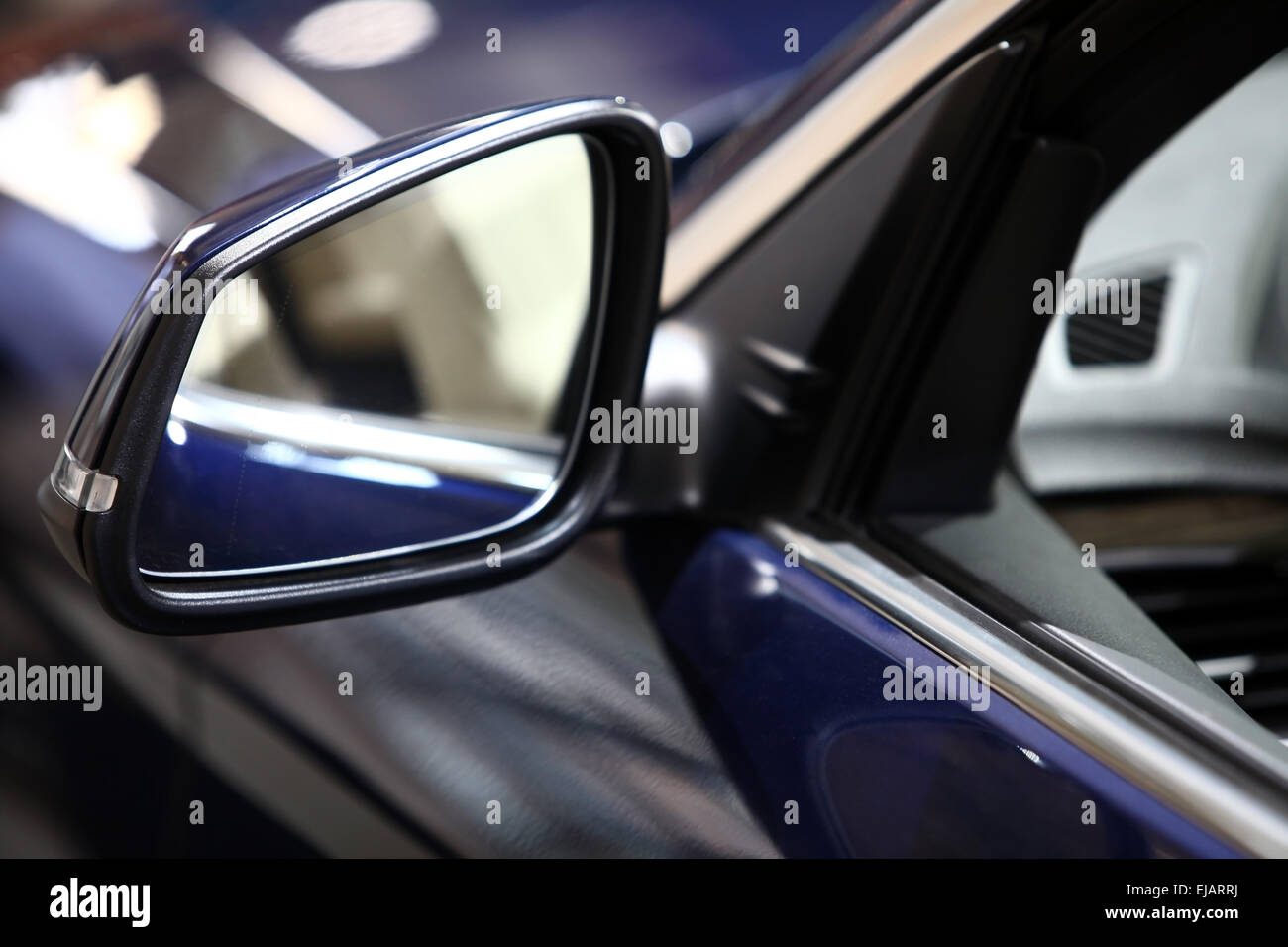 Color vertical shot of a blue car's side mirror Stock Photo - Alamy