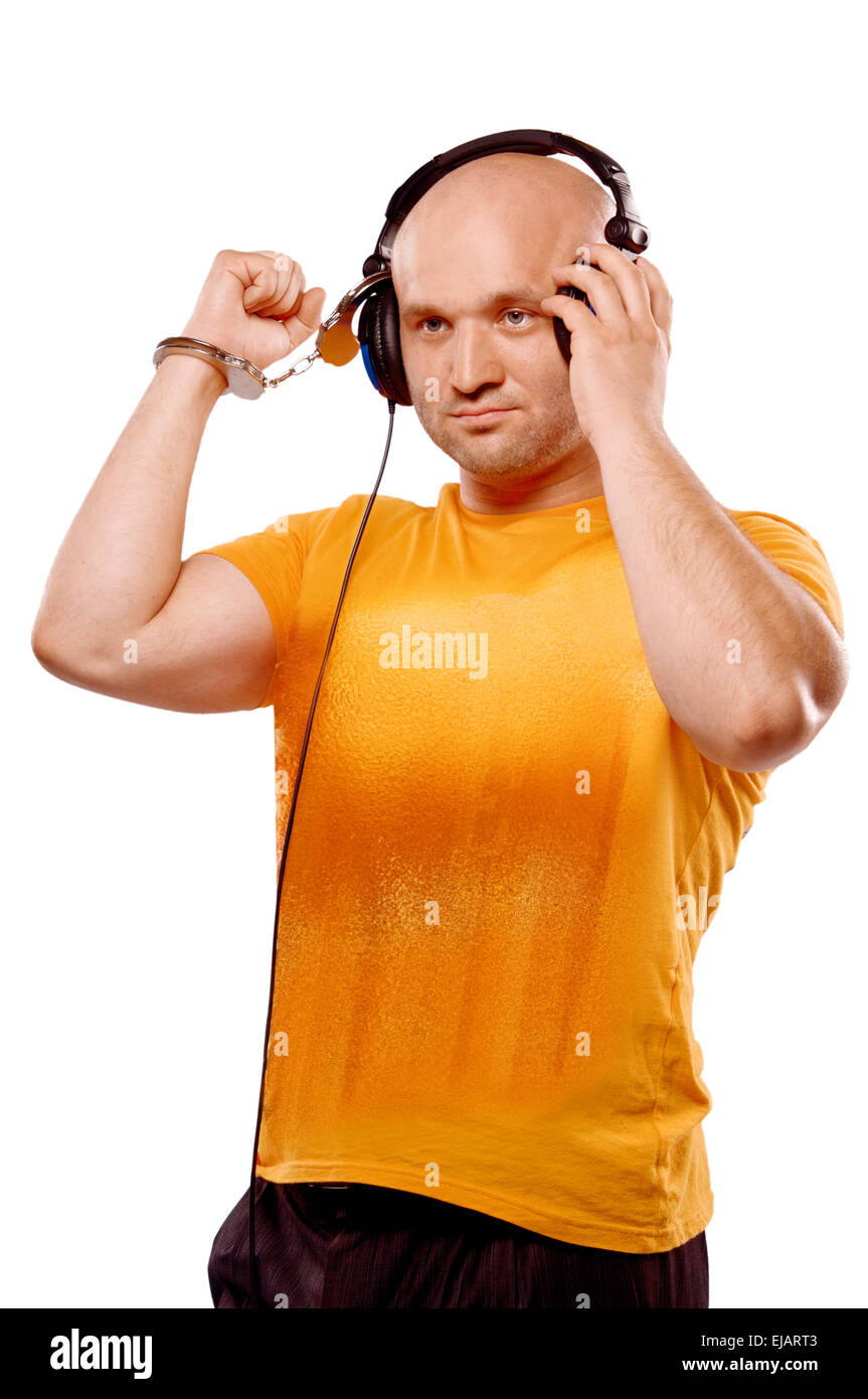 DJ with headphones and handcuffs Stock Photo - Alamy