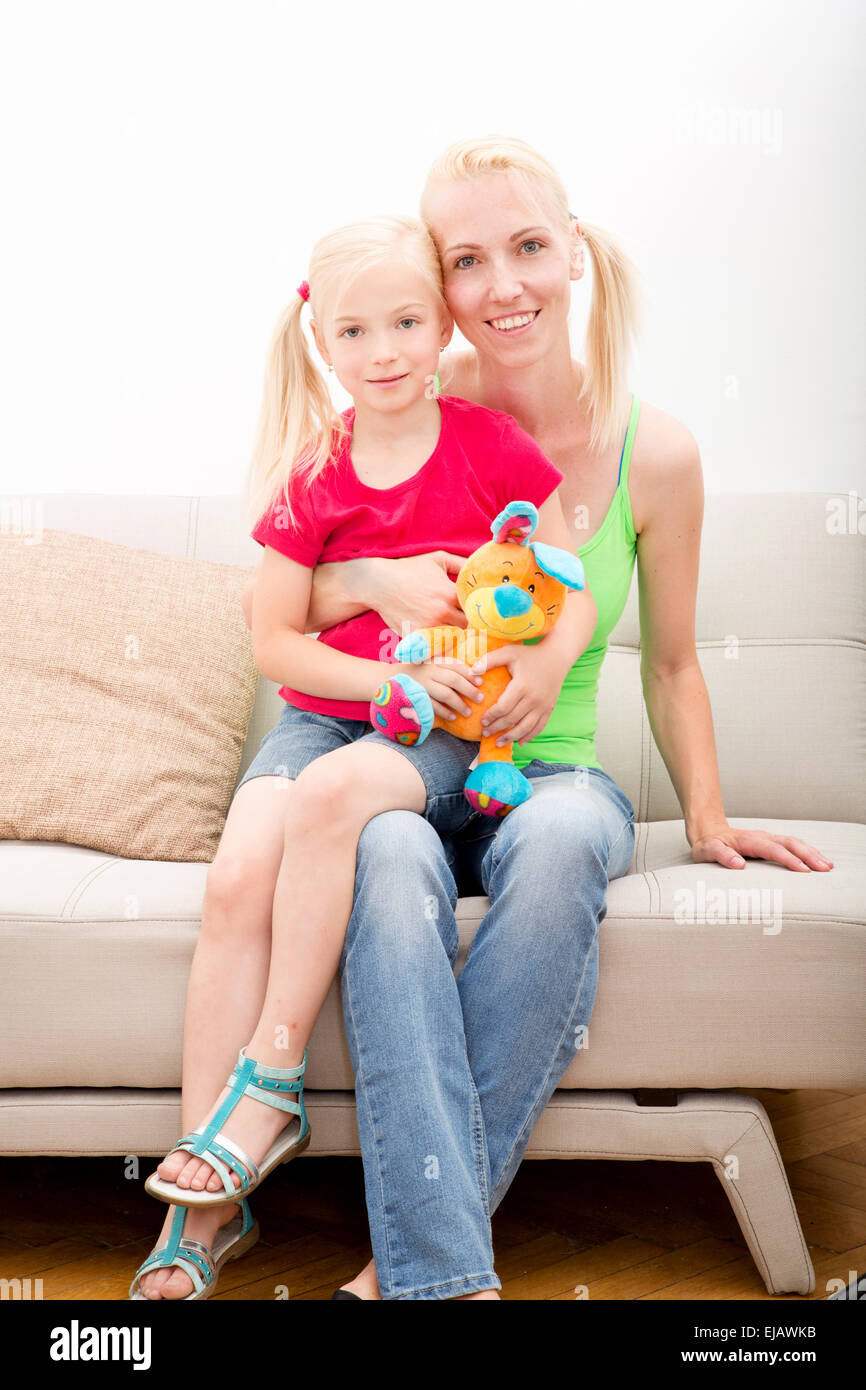 Mother and daughter at home Stock Photo - Alamy
