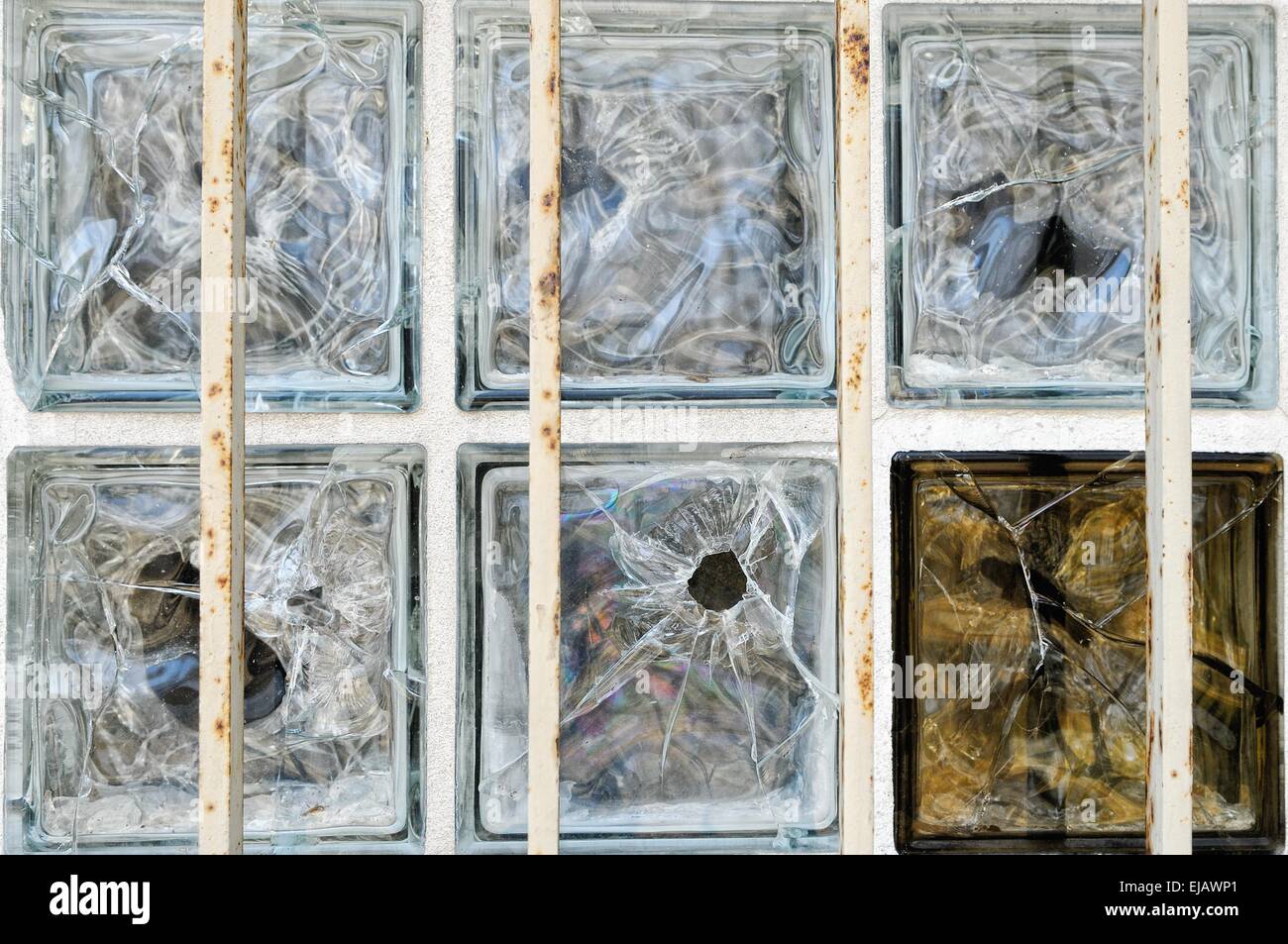 Destruction behind the grid Stock Photo - Alamy