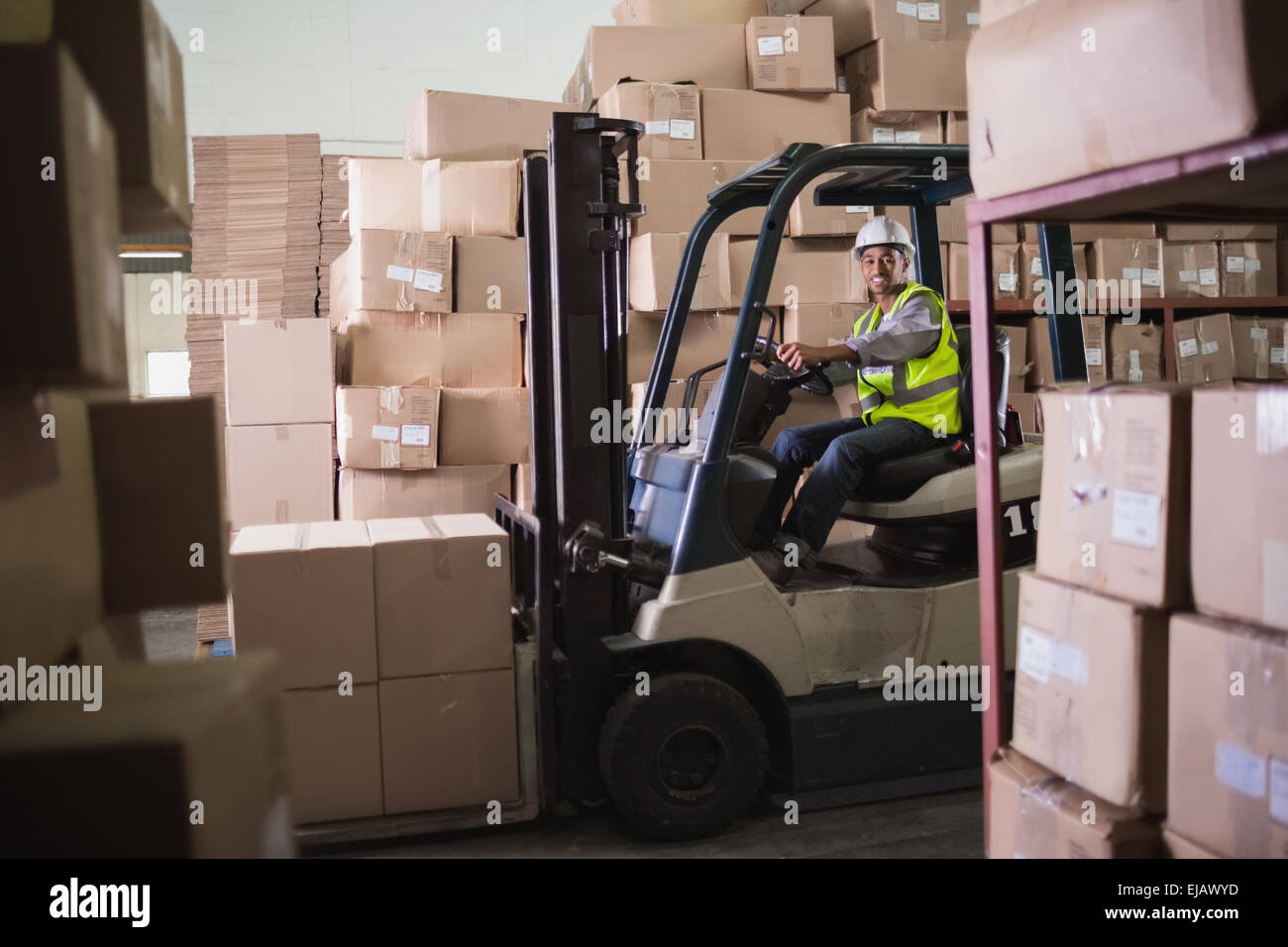 Forklift machine in warehouse Stock Photo - Alamy
