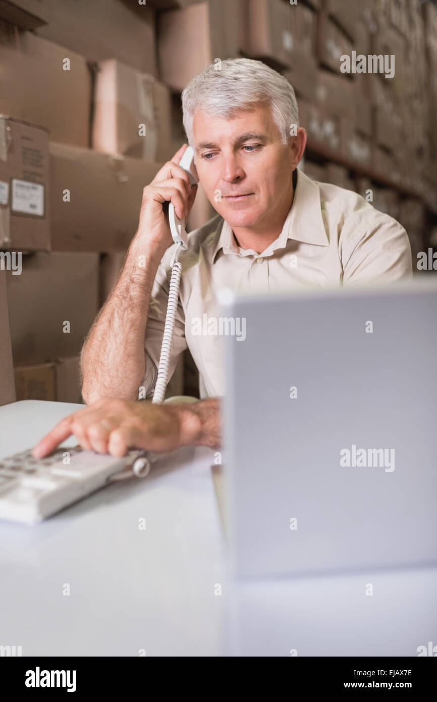 Man using telephone box hi-res stock photography and images - Alamy
