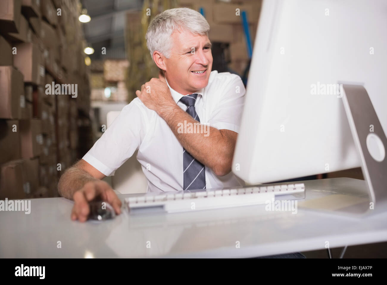 Warehouse manager using computer Stock Photo - Alamy