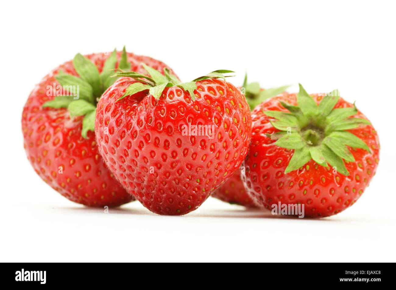 Four strawberries Cut Out Stock Images & Pictures - Alamy