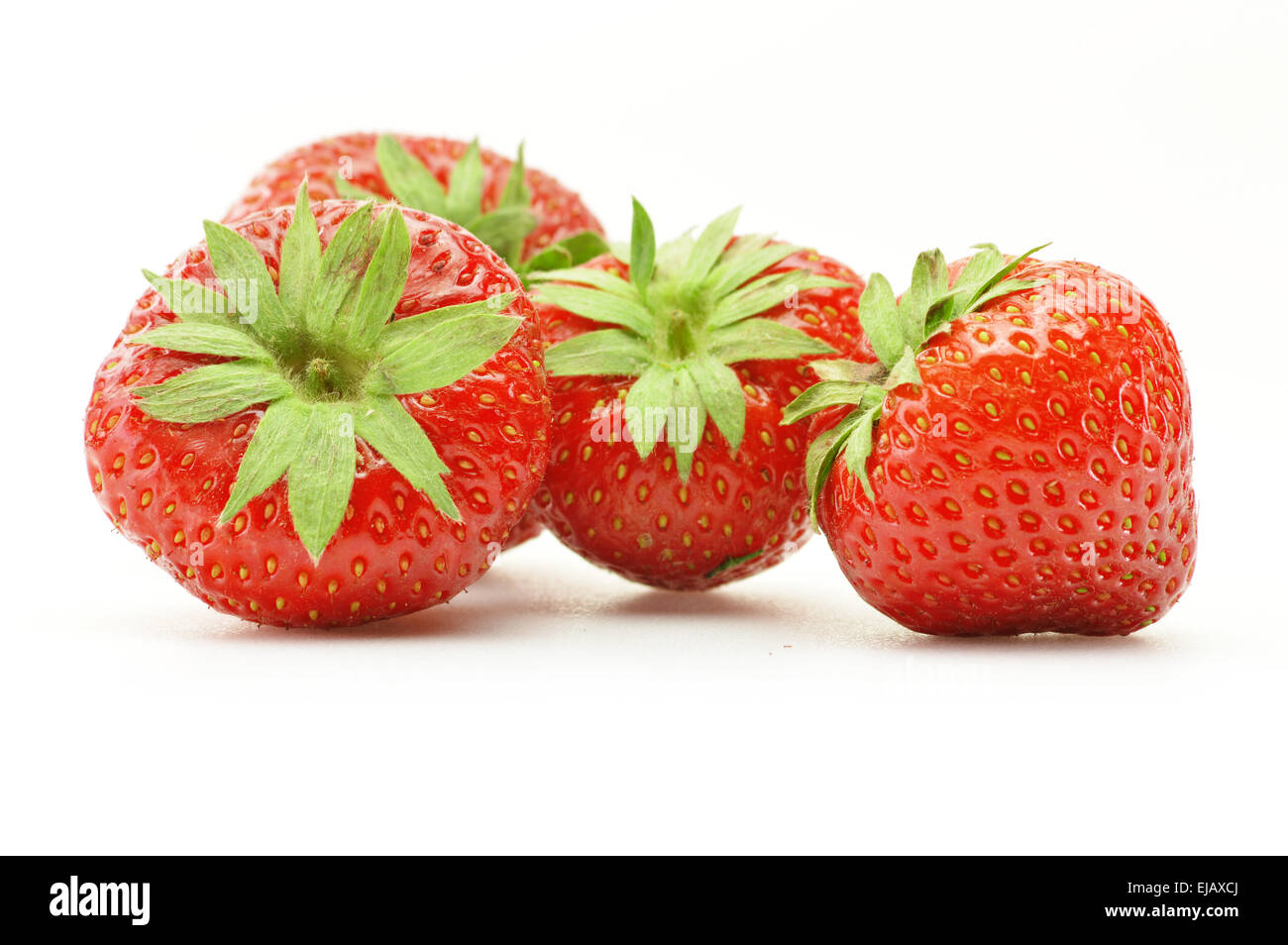 Four strawberries Cut Out Stock Images & Pictures - Alamy
