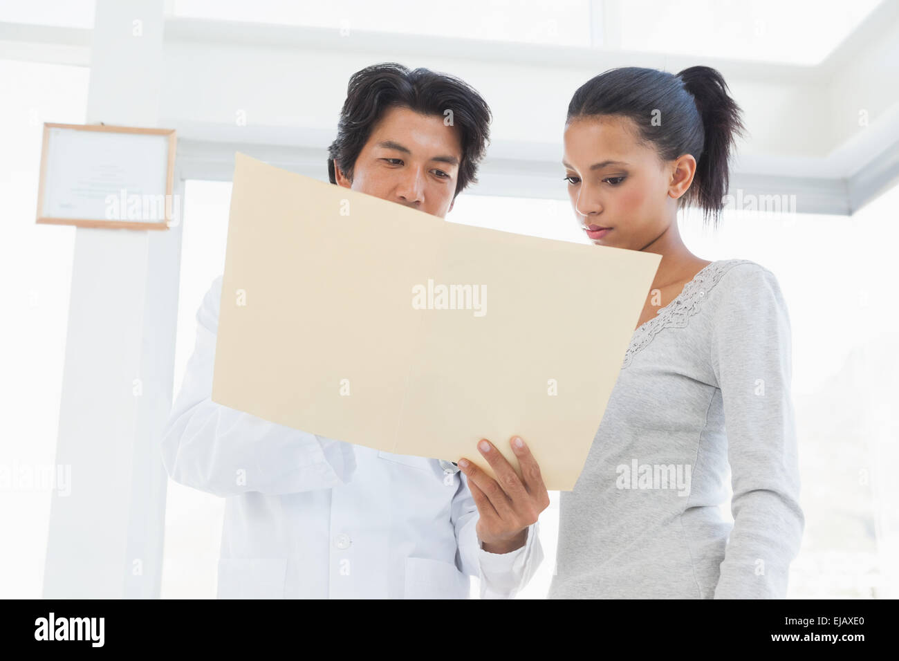 Doctor telling patient her results Stock Photo - Alamy