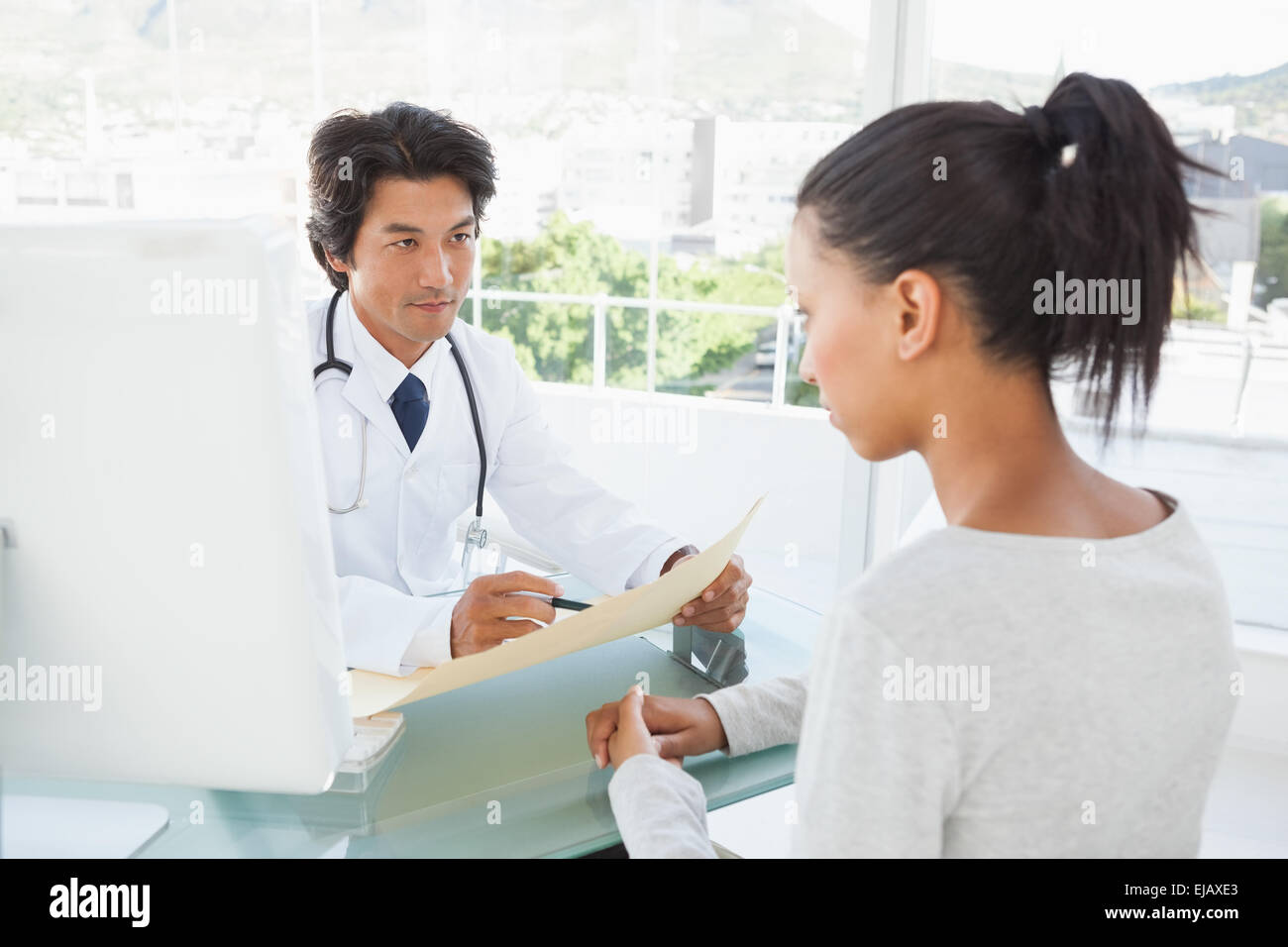 Doctor telling patient her results Stock Photo - Alamy
