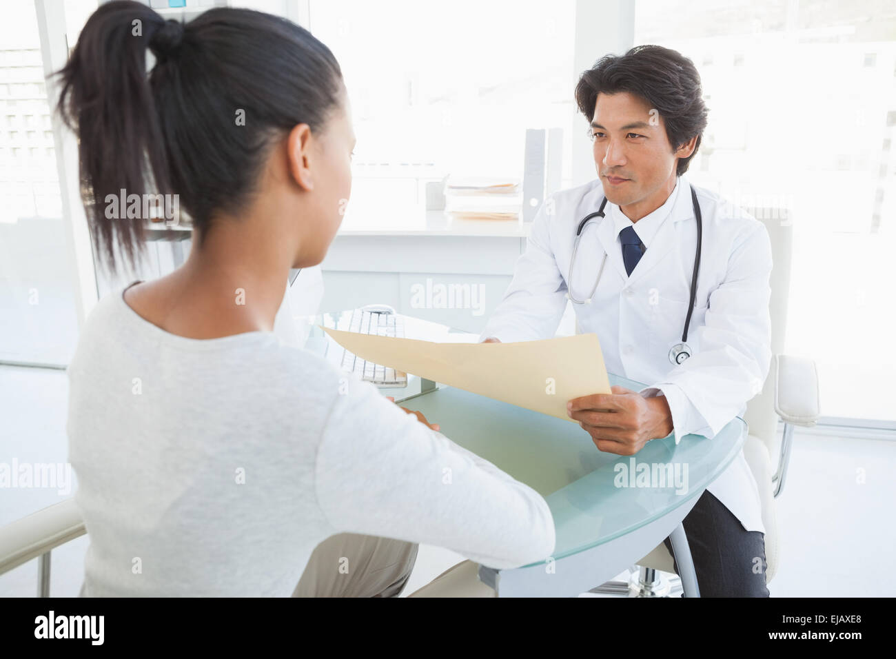 Doctor telling patient her results Stock Photo - Alamy