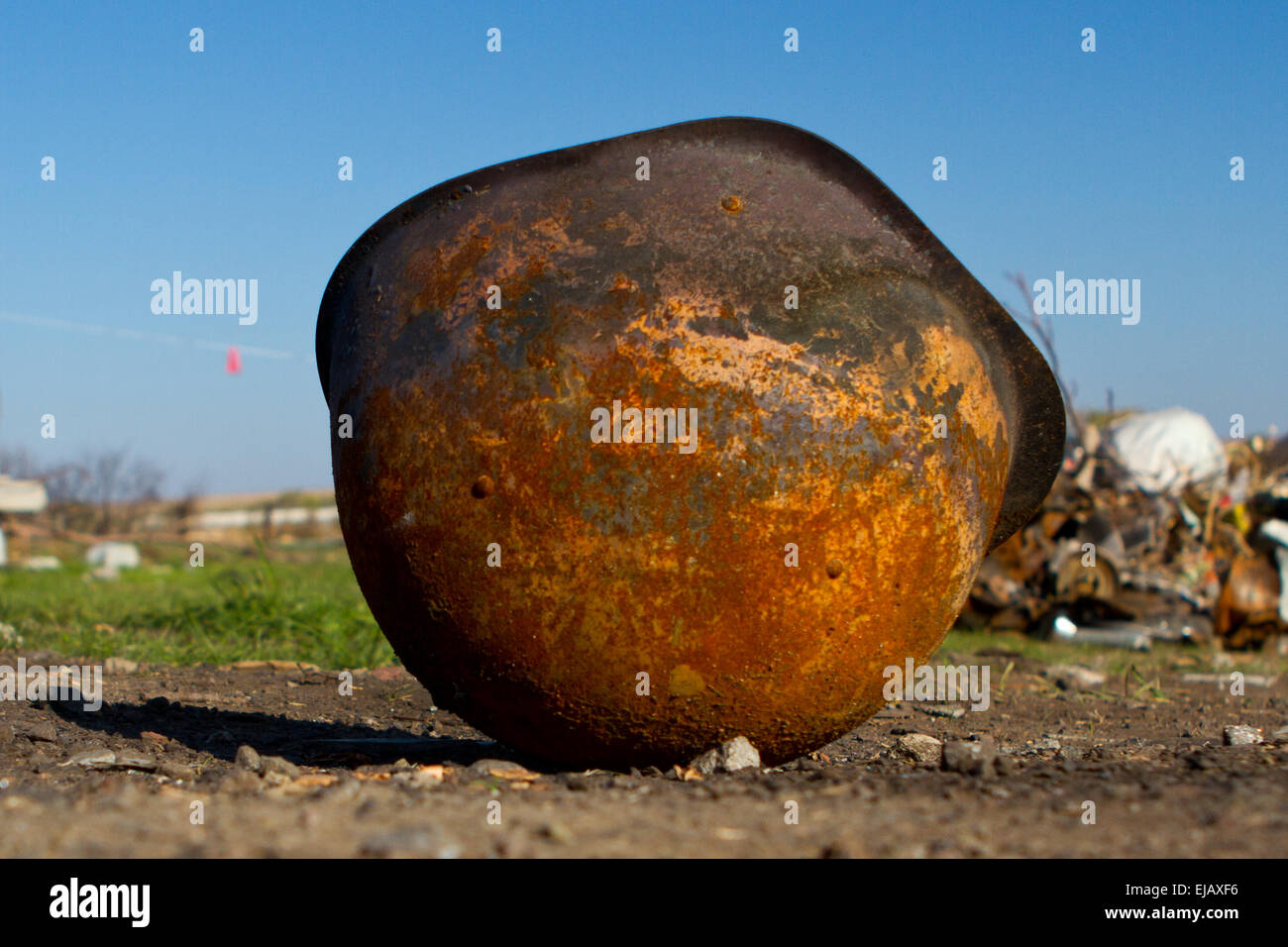 Burned army helmet Stock Photo - Alamy