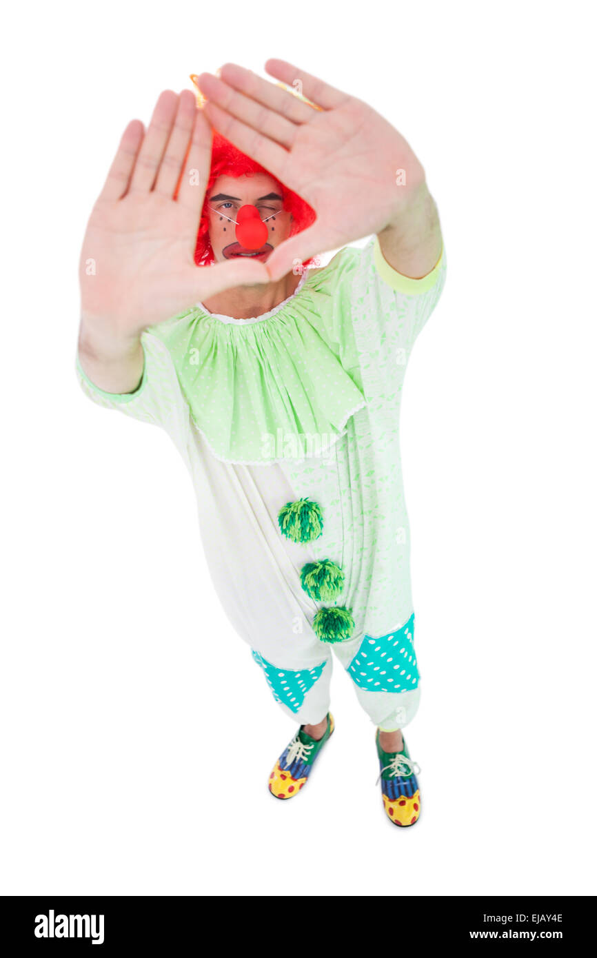 Funny clown framing with hands Stock Photo - Alamy