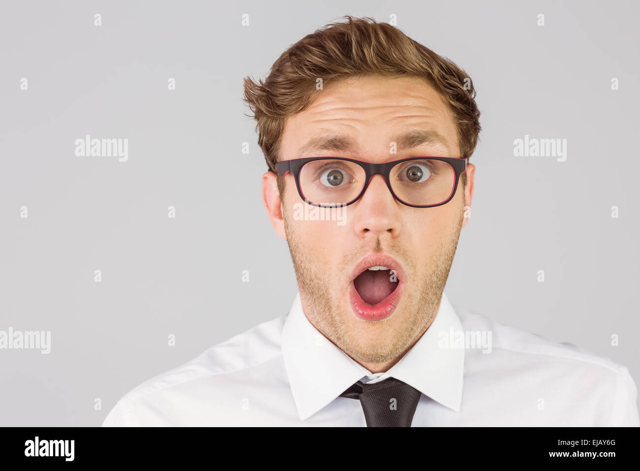 Geeky man looking to camera hi-res stock photography and images - Alamy