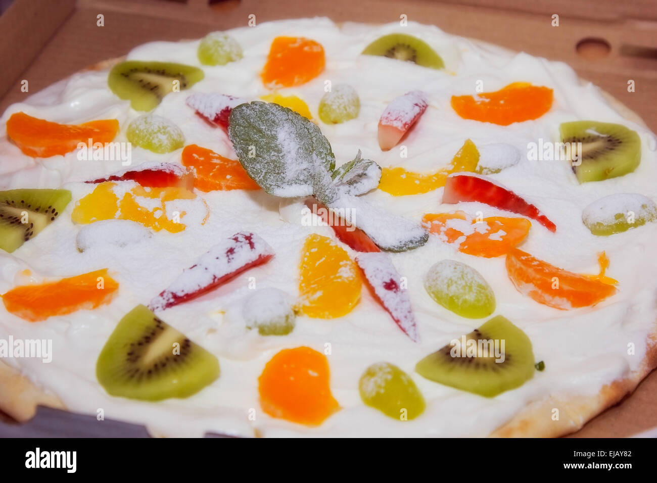 sweet pizza with fruit. Italian food Stock Photo - Alamy