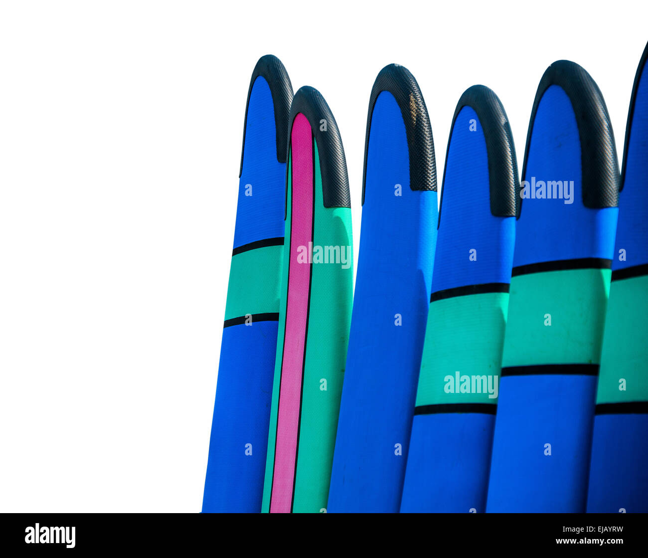 Color surf boards in a stack by ocean Stock Photo - Alamy